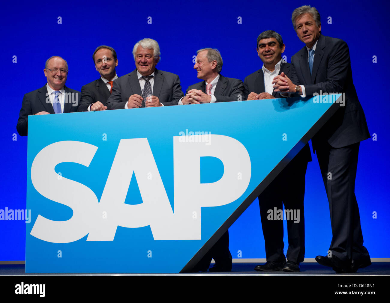 Members of the board of SAP Gerhard Oswald (L-R), spokesman of the ...