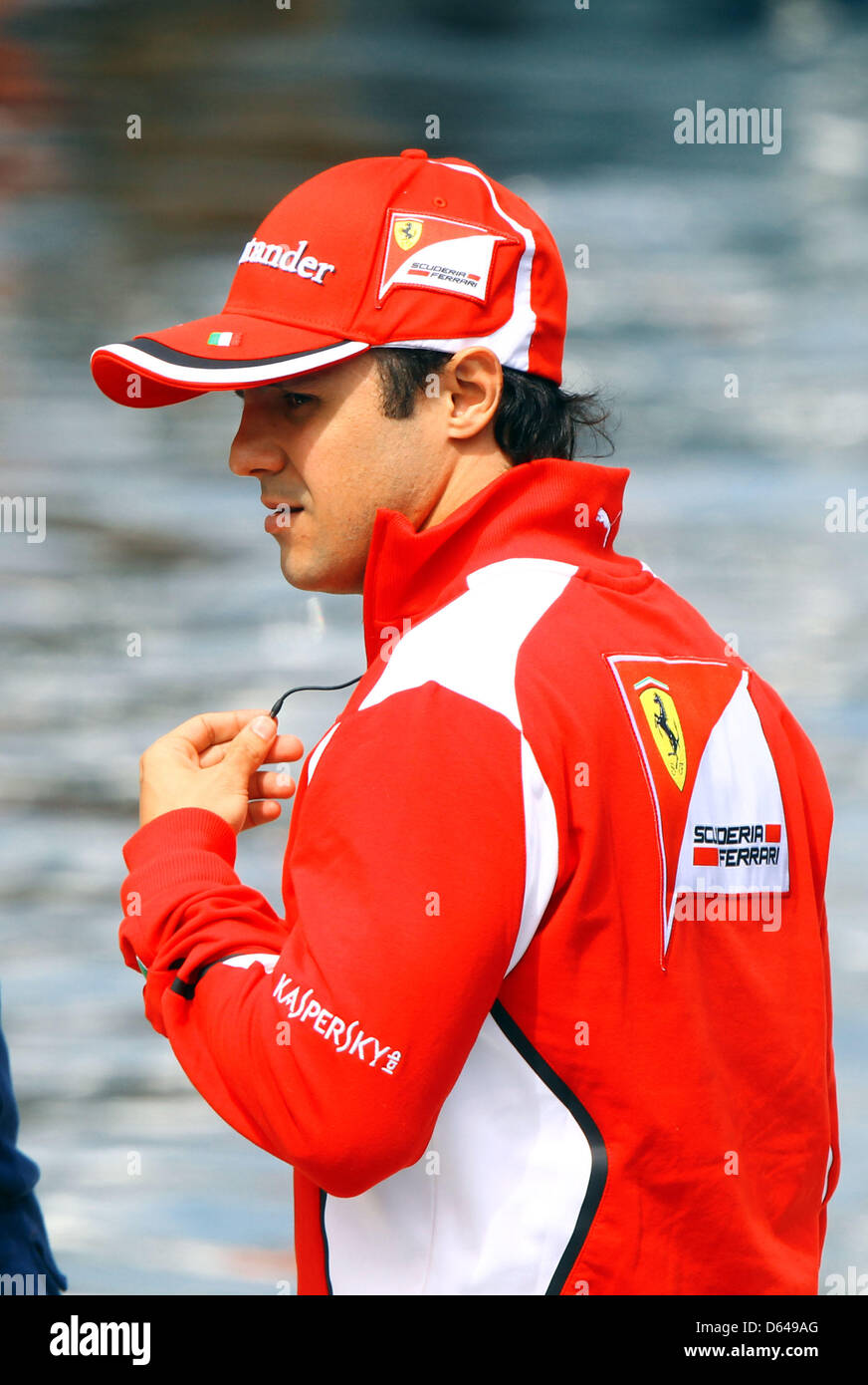 Brazilian Formula One driver Felipe Massa of Ferrari walks through the ...