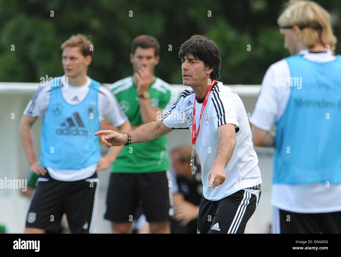 Germany's national soccer coach Joachim Loew (c) gestures a soccer ...