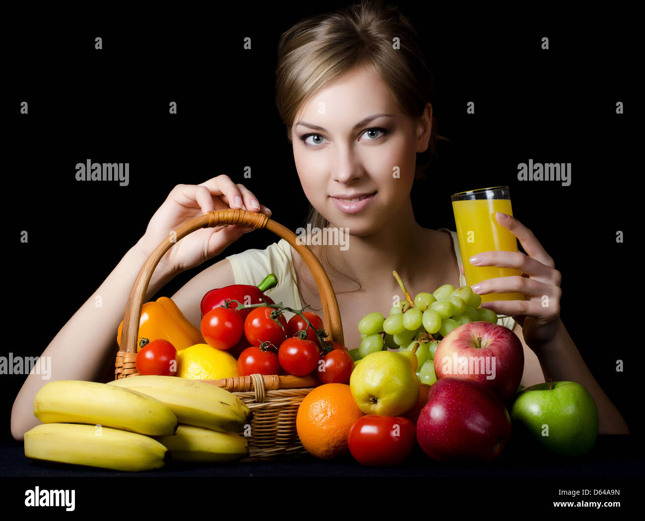 Beautiful girl with fruit and vegetables Stock Photo - Alamy