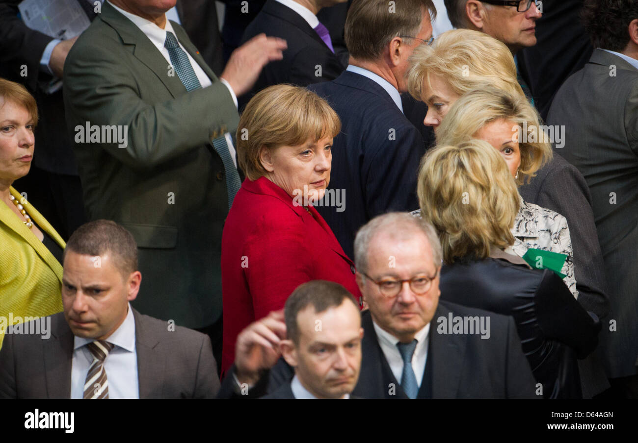Angela Merkel is pictured amidst members of parliament after Altmaier's ...