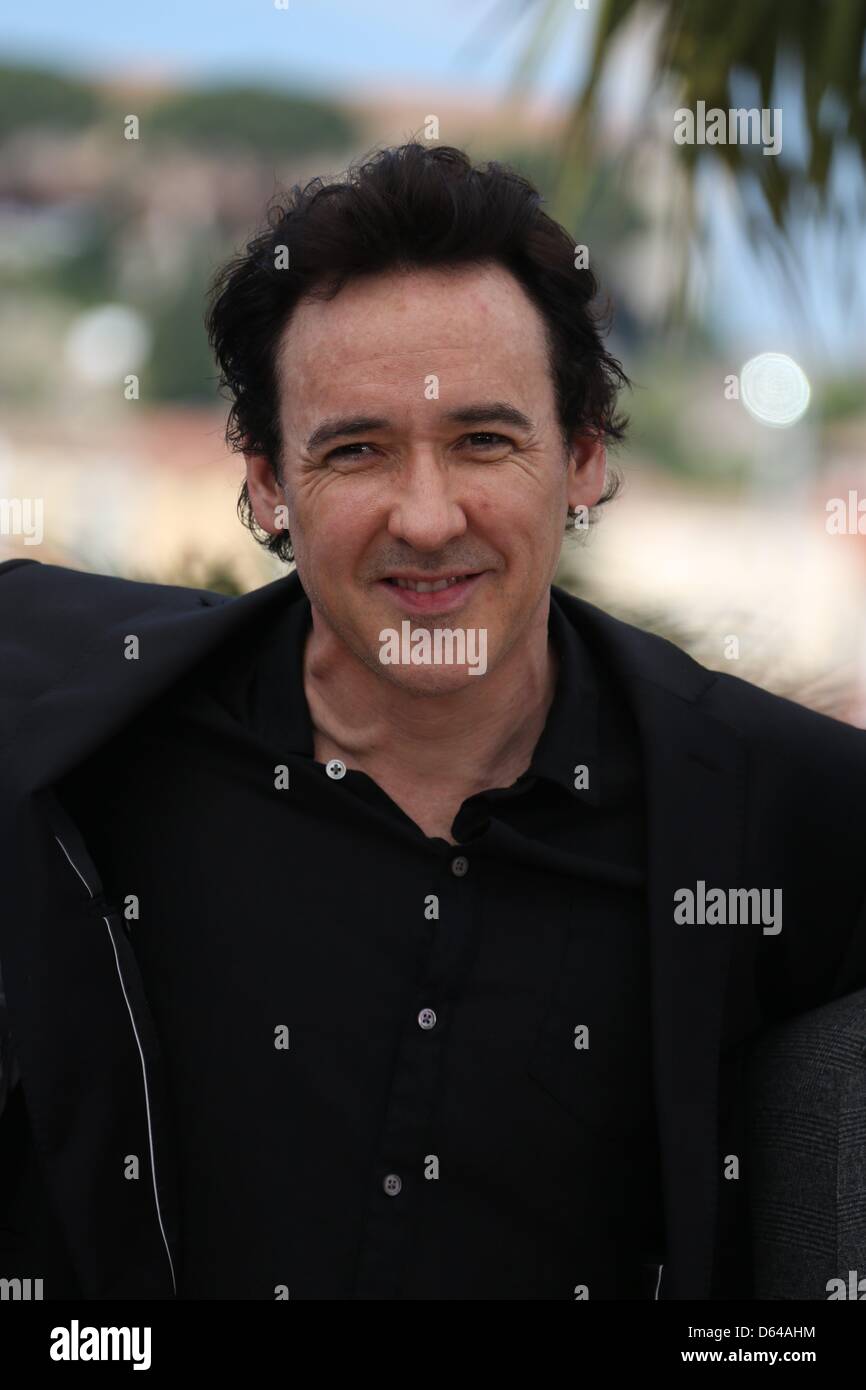 Actor John Cusack poses at the photocall of "The Paperboy" during the ...
