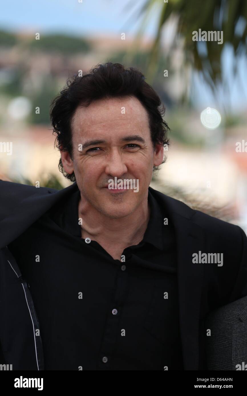 Actor John Cusack poses at the photocall of "The Paperboy" during the ...