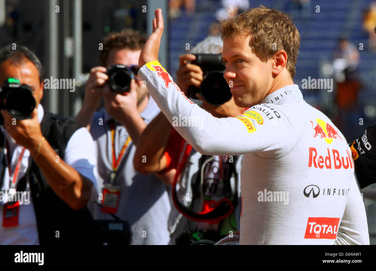 German Formula One driver Sebastian Vettel of Red Bull waves to the ...