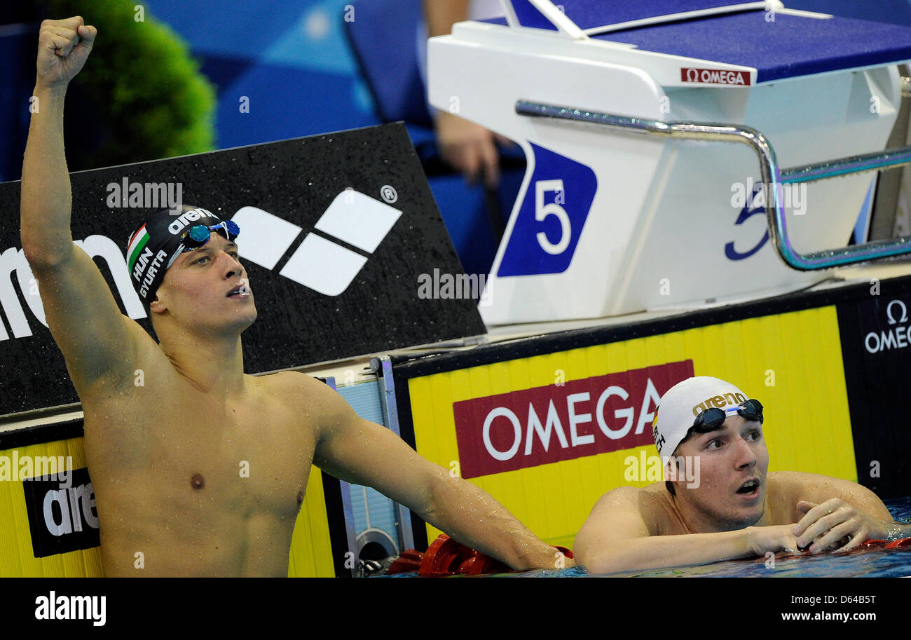 Hungary's Daniel Gyurta (L) celebrates close to Germany's Marco Koch ...