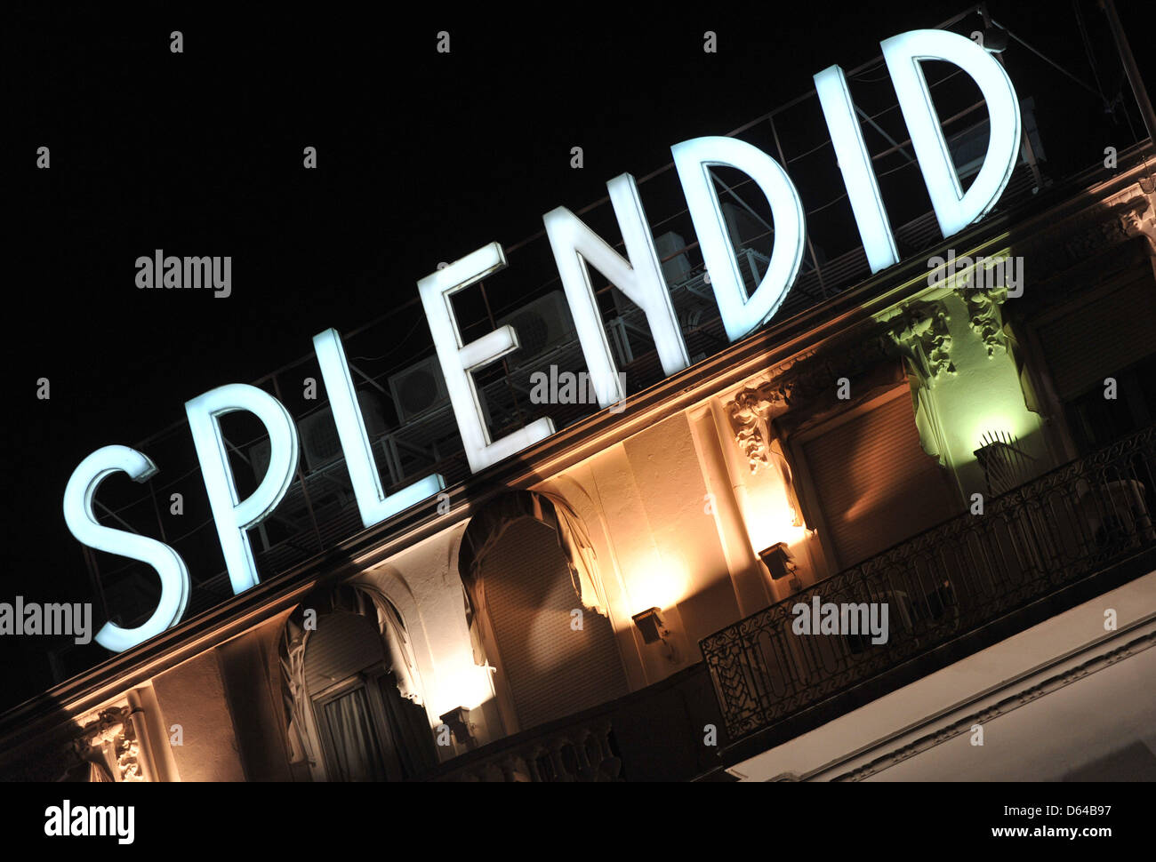 An illuminated sign read 'splendid' on top of a hotel in Cannes, France ...