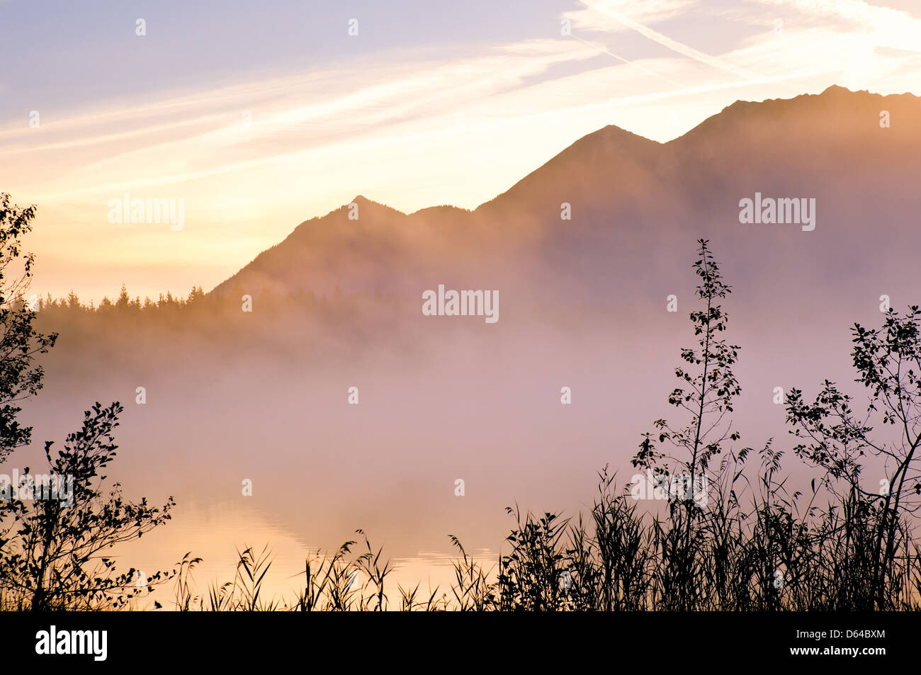 sunrise on alpine lake Stock Photo - Alamy