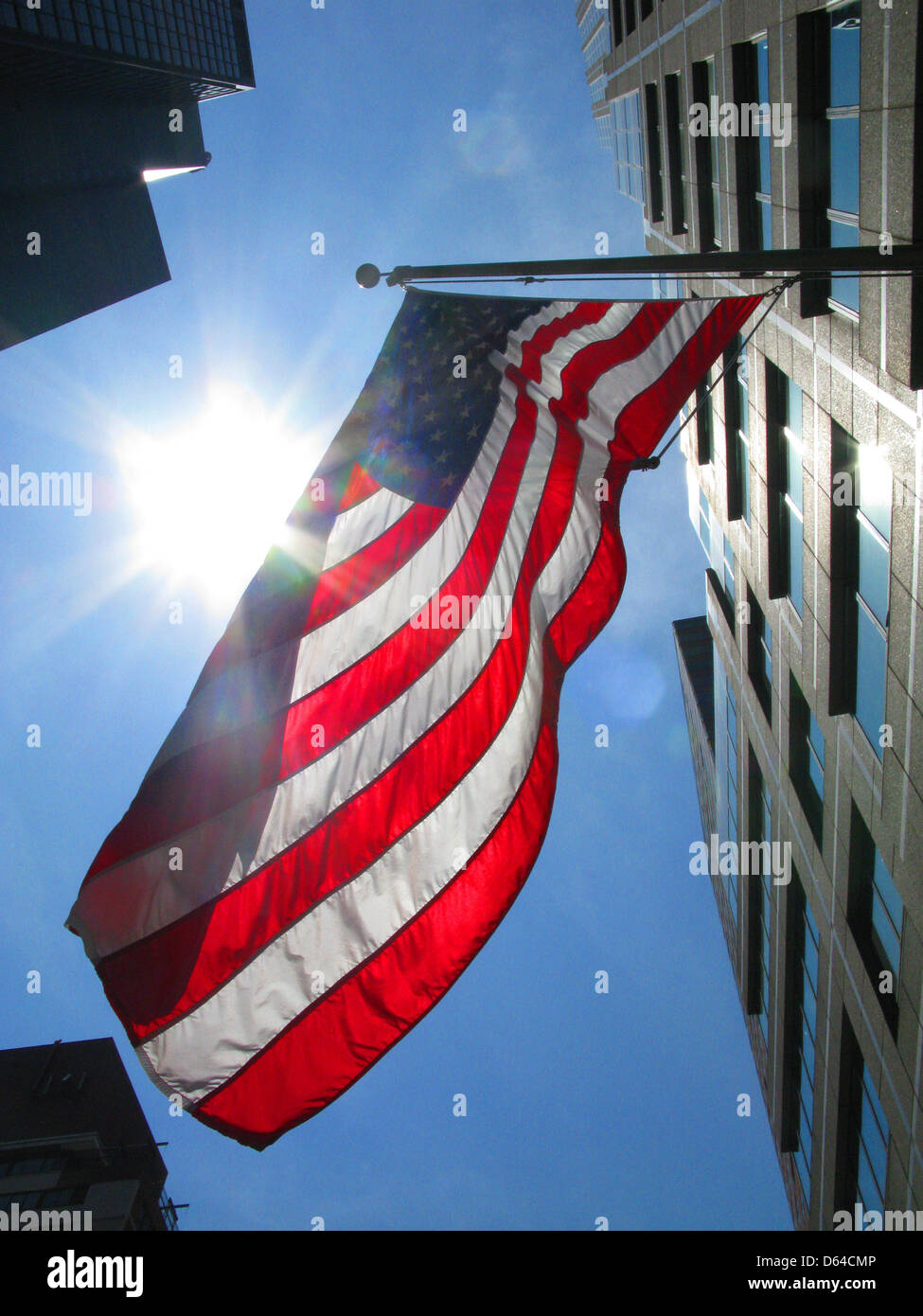 USA Flag on a skyscraper building Stock Photo - Alamy