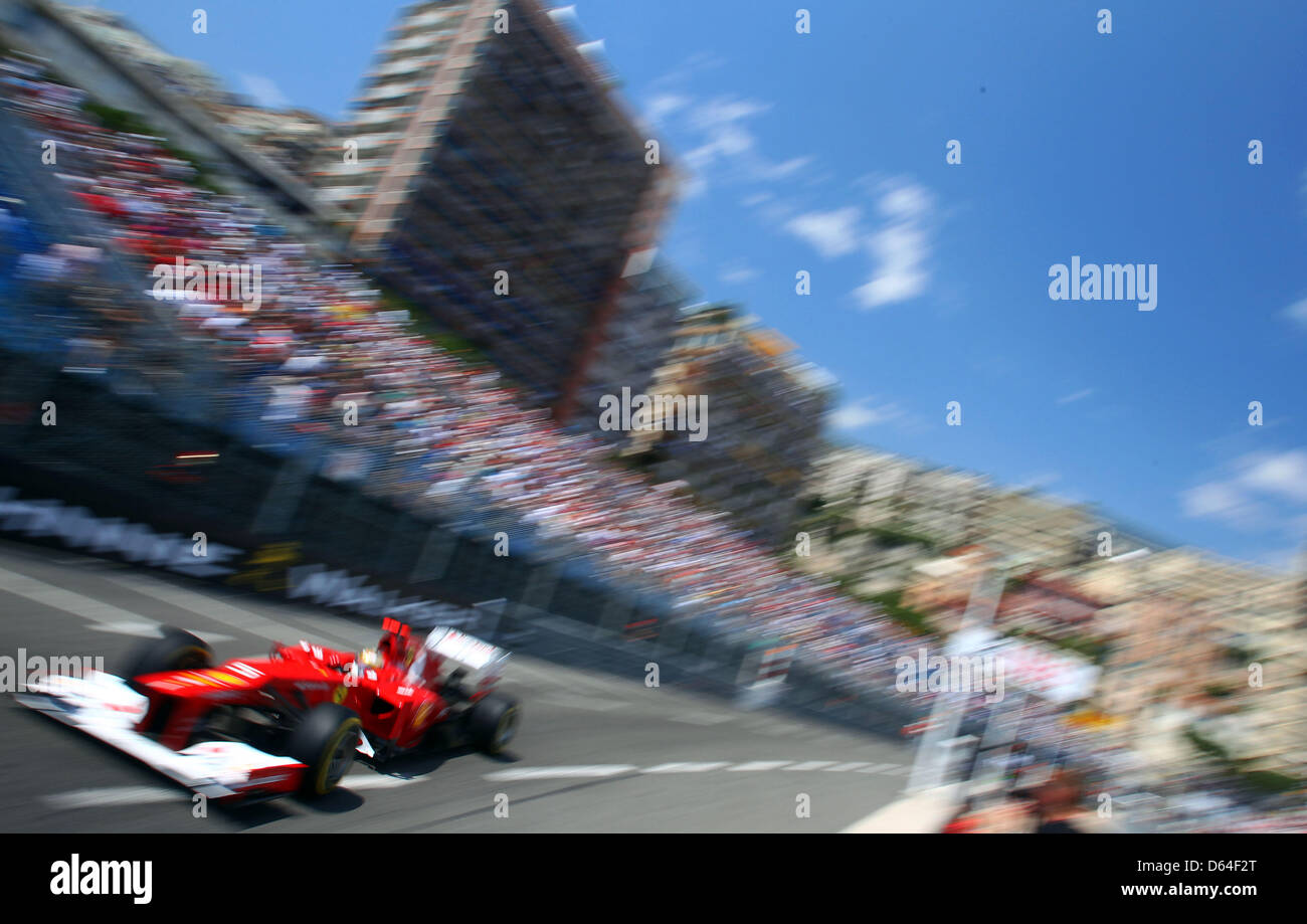 Spanish Formula One driver Fernando Alonso of Ferrari steers his car ...