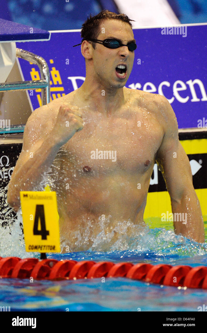 Serbia's Milorad Cavic celebrates after winning the men's 100 Meter ...