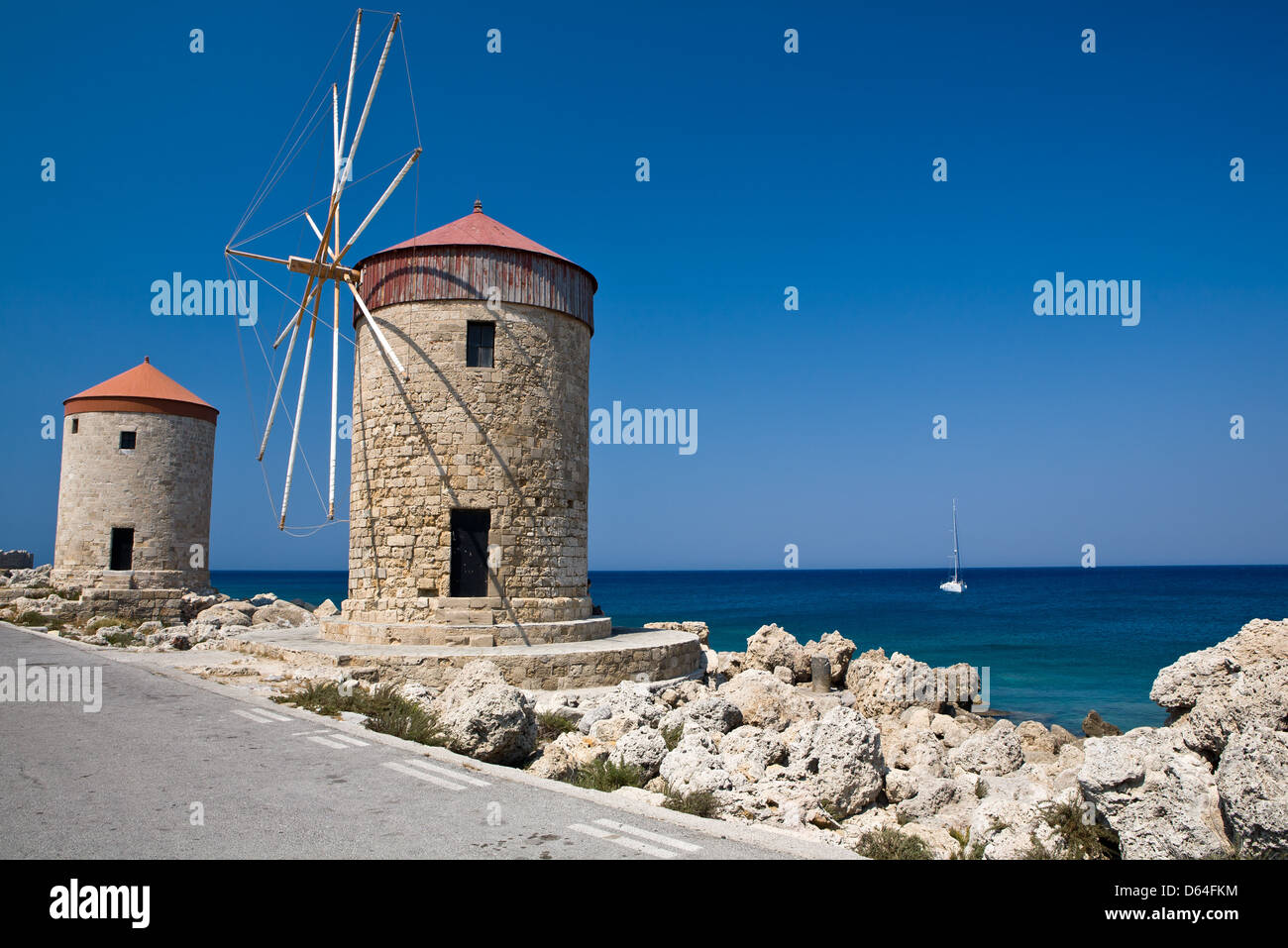 Ancient windmills in Rhodes city on the Island of Rhodes, Greece Stock ...