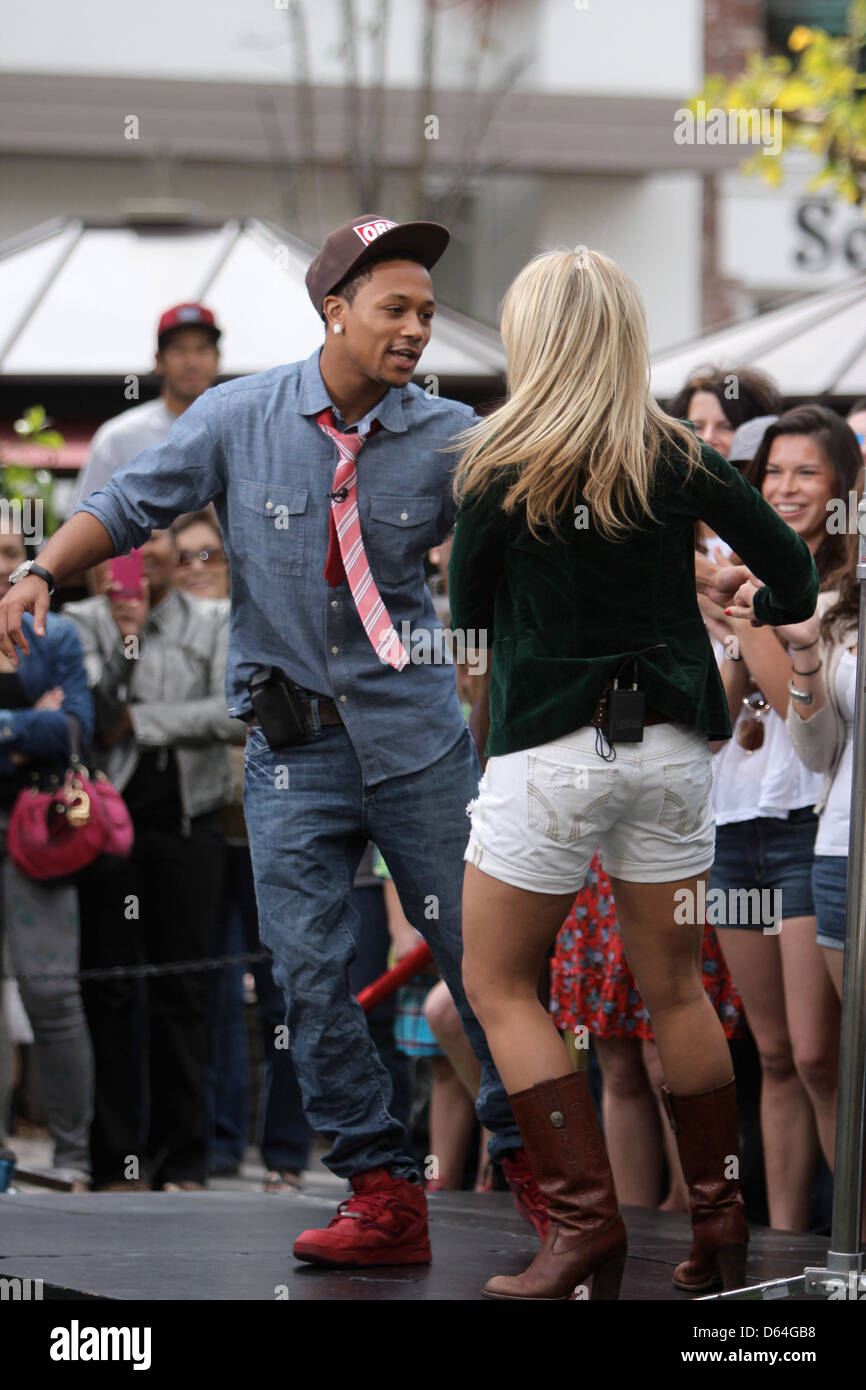 Romeo and Chelsie Hightower film an interview segment for 'Extra' with ...