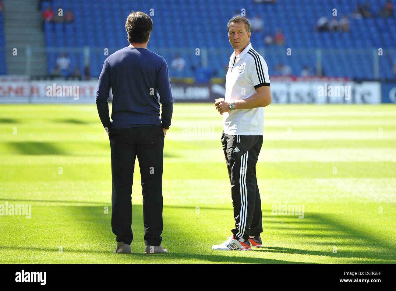 The coach of the German national soccer team, Joachim Loew (l) and ...