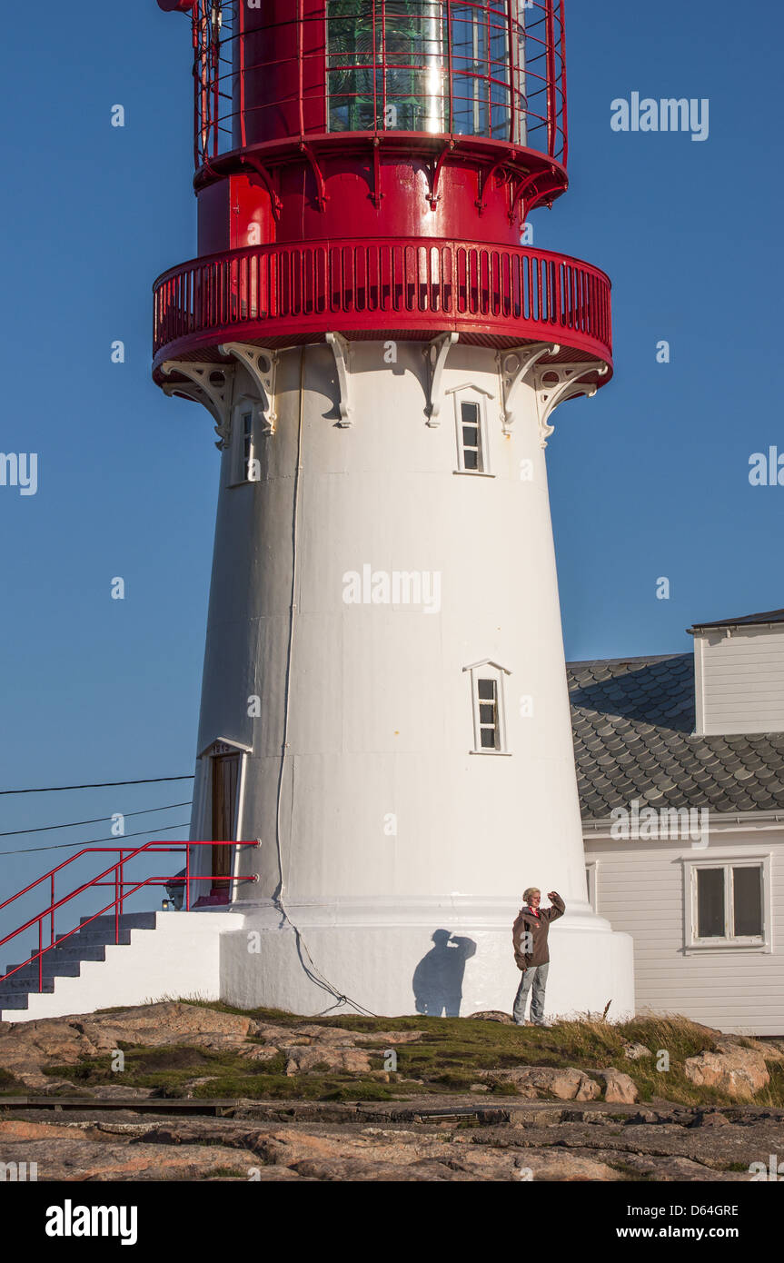 Girl and lighthouse Stock Photo - Alamy