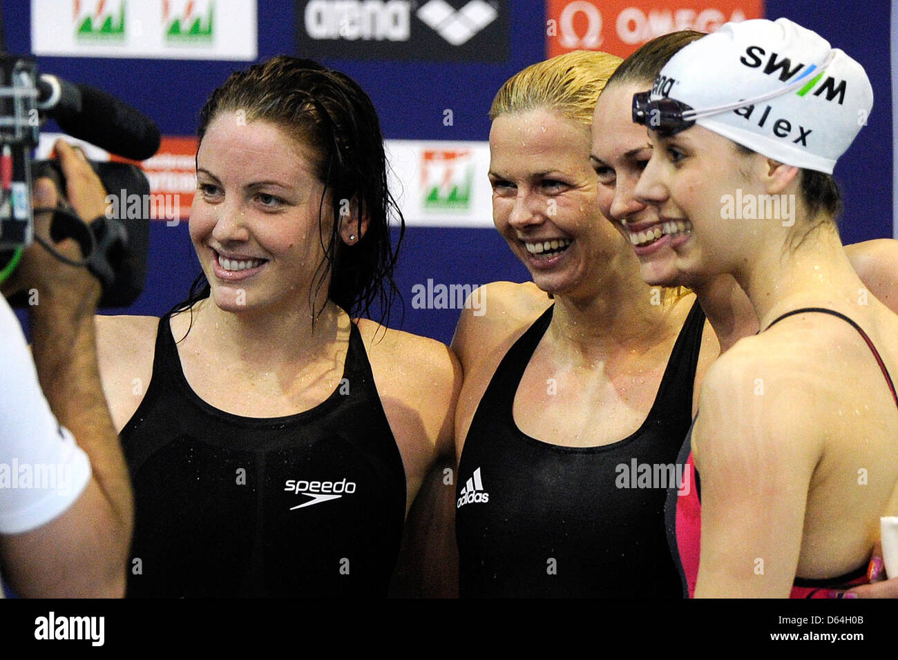 Germany's Sarah Poewe (L-R), Britta Steffen, Jenny Mensing and ...