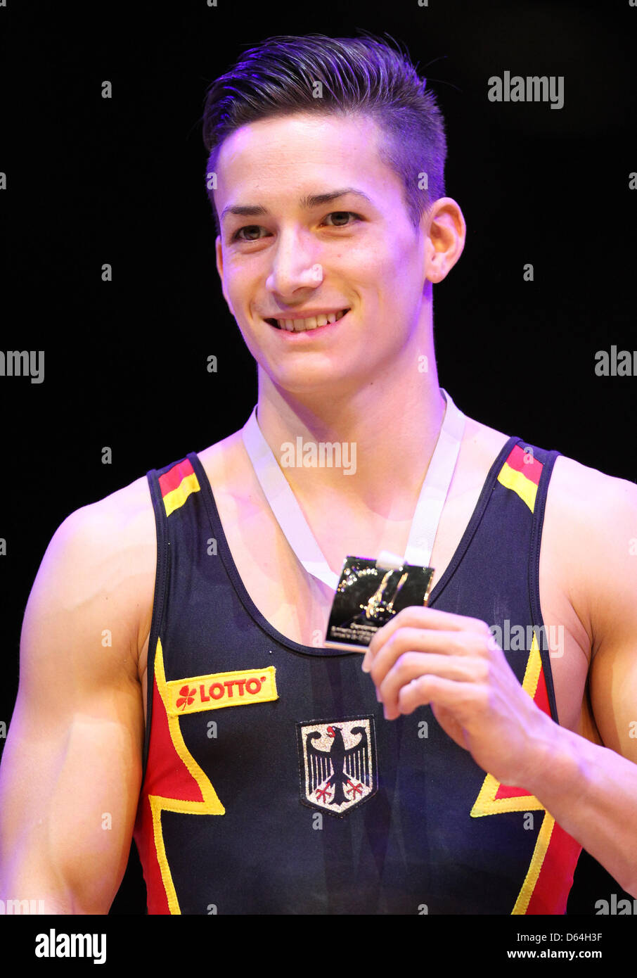 Gold medal winner Marcel Nguyen of Germany celebrates after the ...