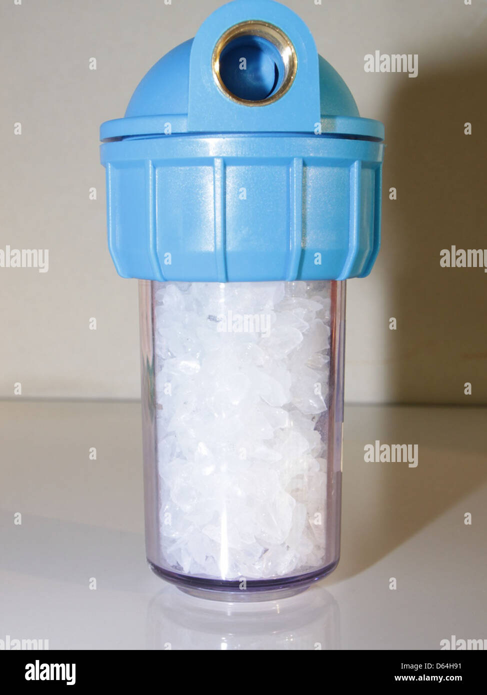 This image features a polyphosphate filter used in water treatment ...