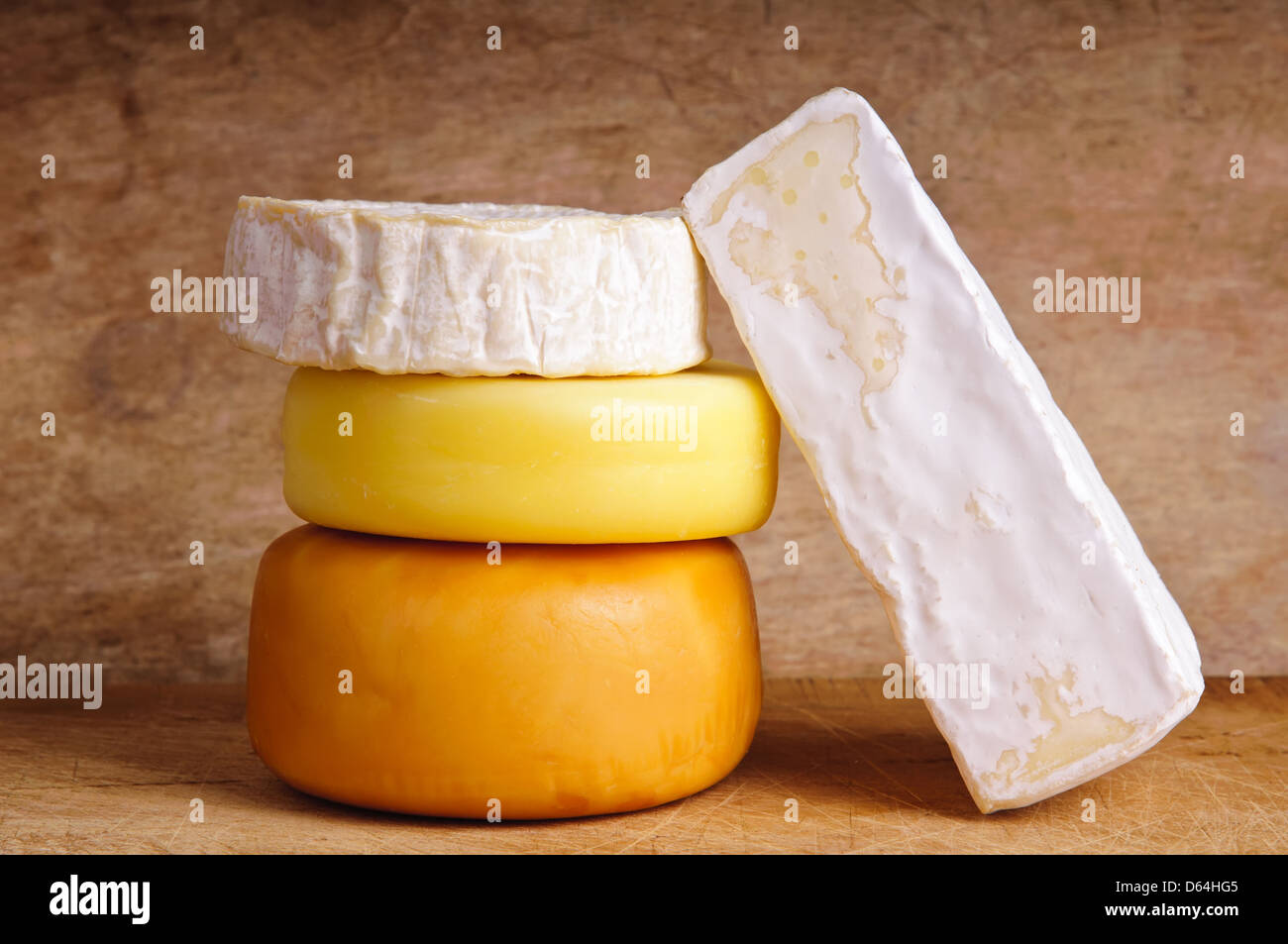 group of diffent traditional chesse on a vintage wooden background ...