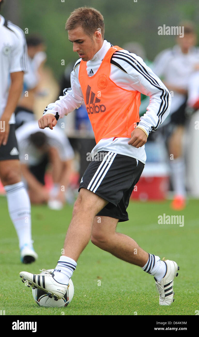 German national soccer player Philipp Lahm plays the ball during a ...