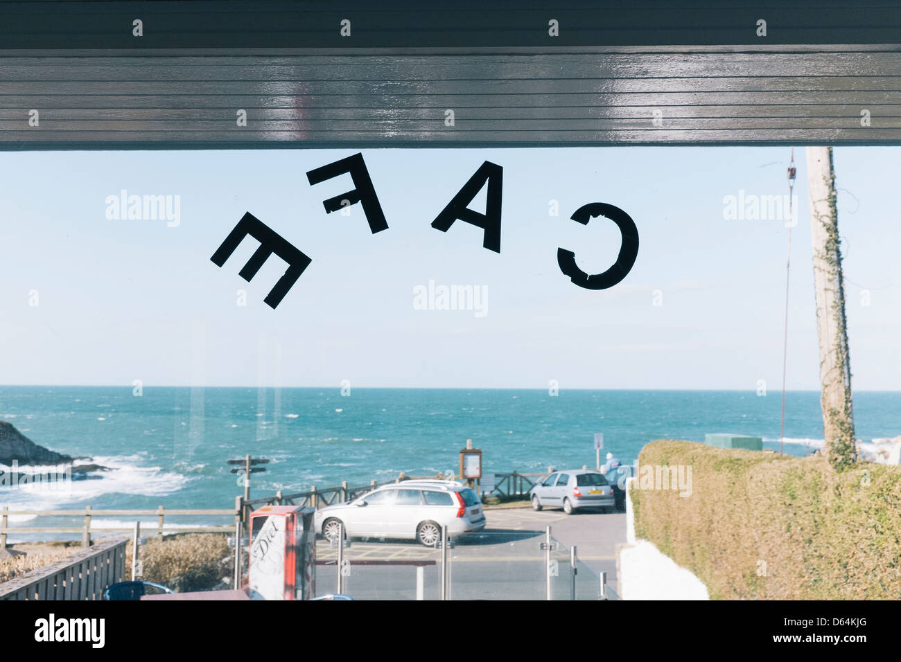 View of ocean from inside a beach side cafe Stock Photo - Alamy