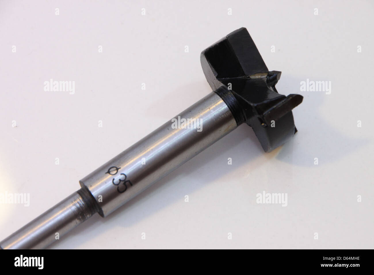 A professional-grade carbide Forstner bit used for drilling precise ...