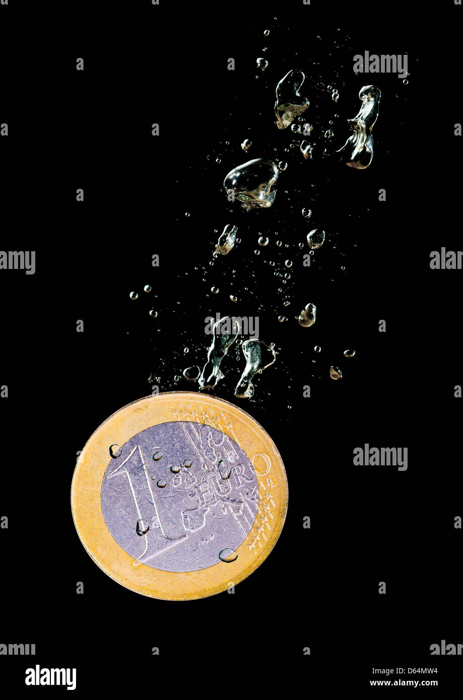 Concept with euro coin sinking in water over black background Stock ...