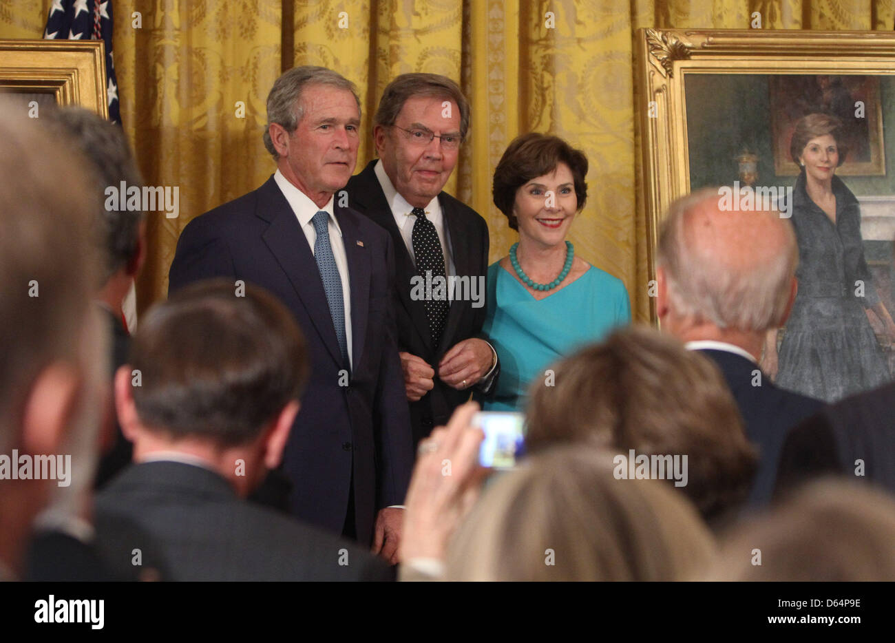 Former United States President George W. Bush (left) and former first ...