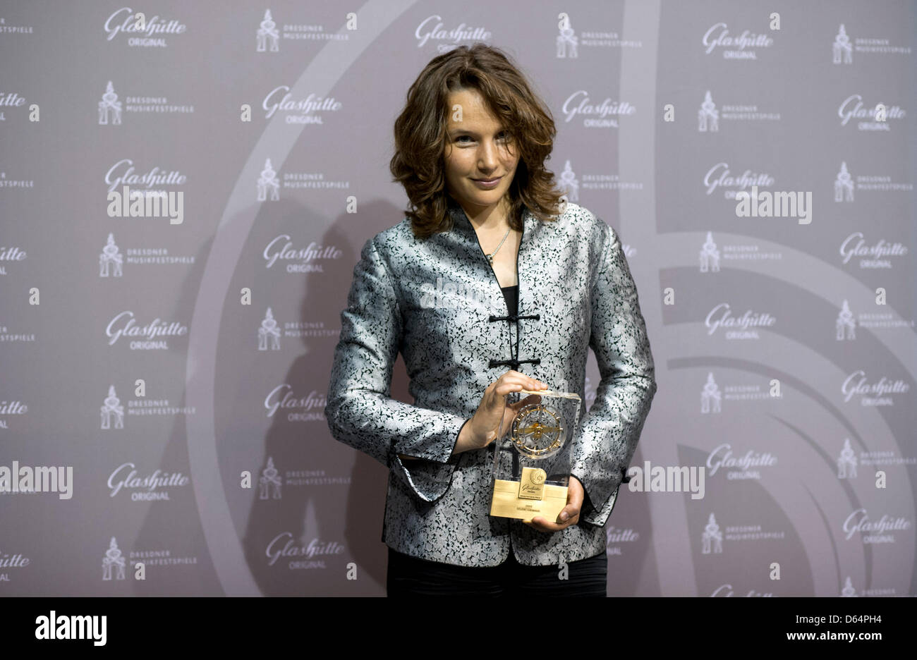 French pianist Helene Grimaud poses for a picture as she holds her ...