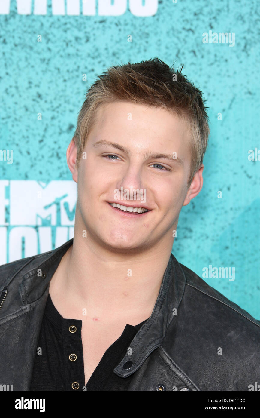 Actor Alexander Ludwig arrives on the red carpet of the 2012 MTV Movie ...