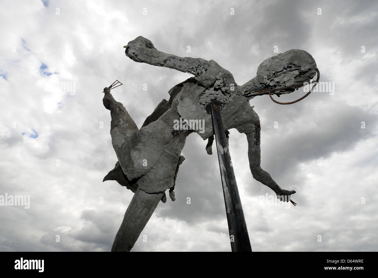 A clay sculpture of Argentinian artist Adrian Villar Rojas is worked on ...