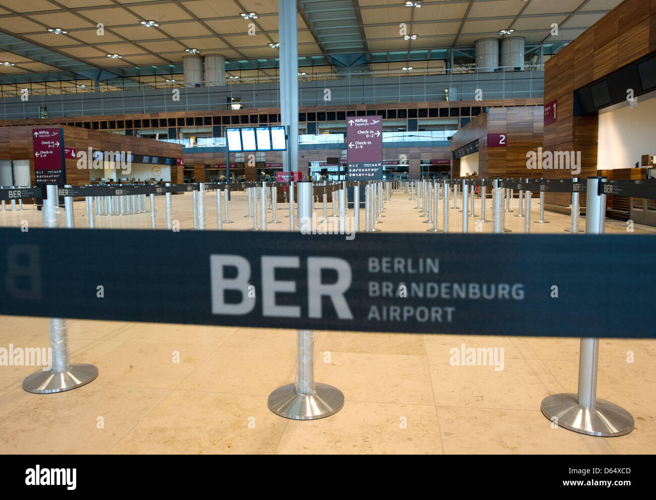 Check-in counters are pictured at the terminal of the new Berlin ...