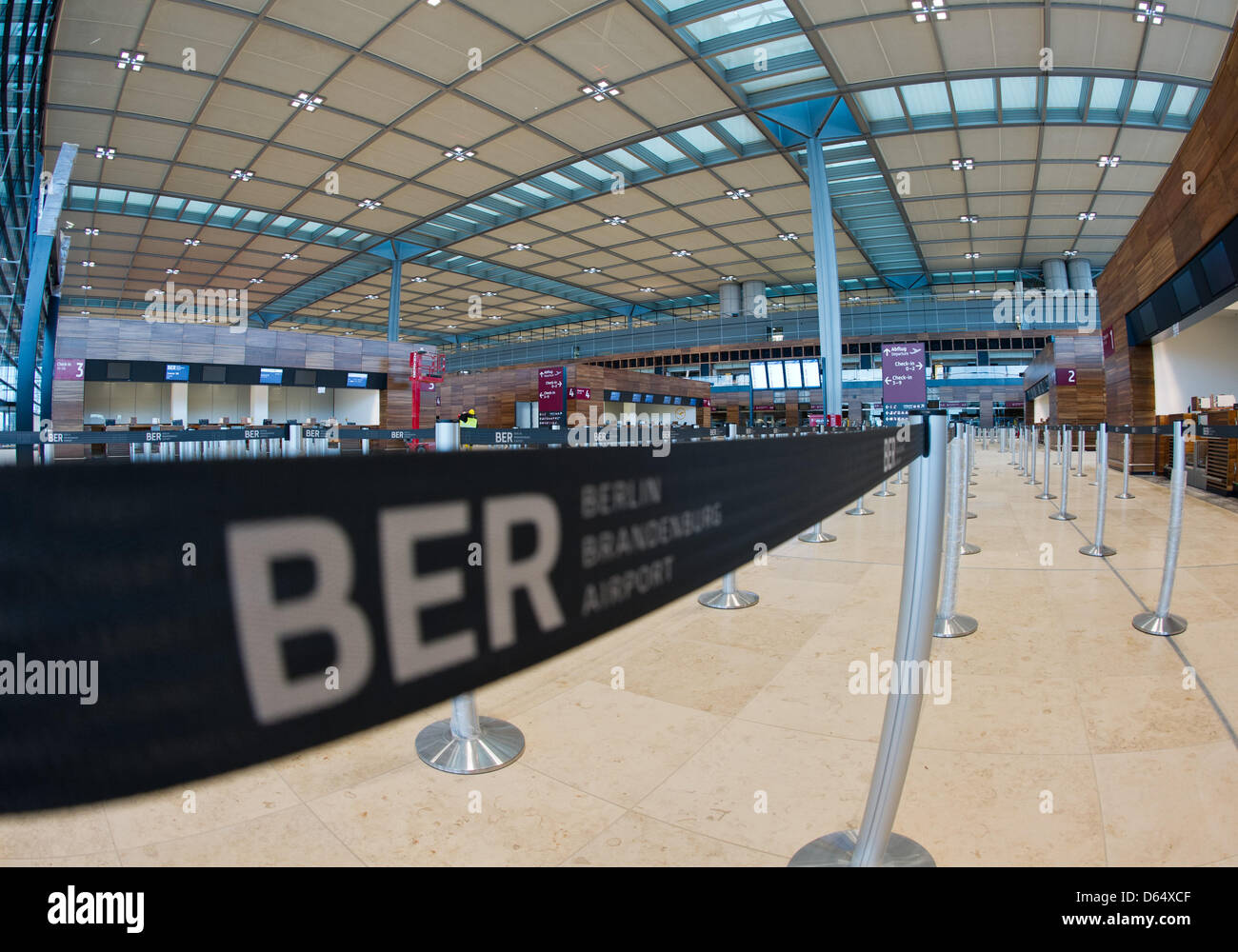 Check-in counters are pictured at the terminal of the new Berlin ...