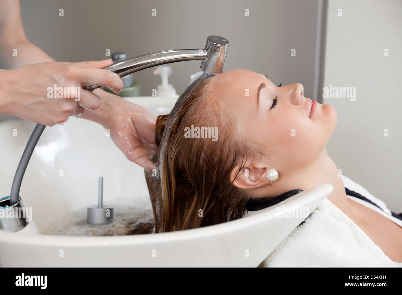 Hair Wash At Salon Stock Photo - Alamy