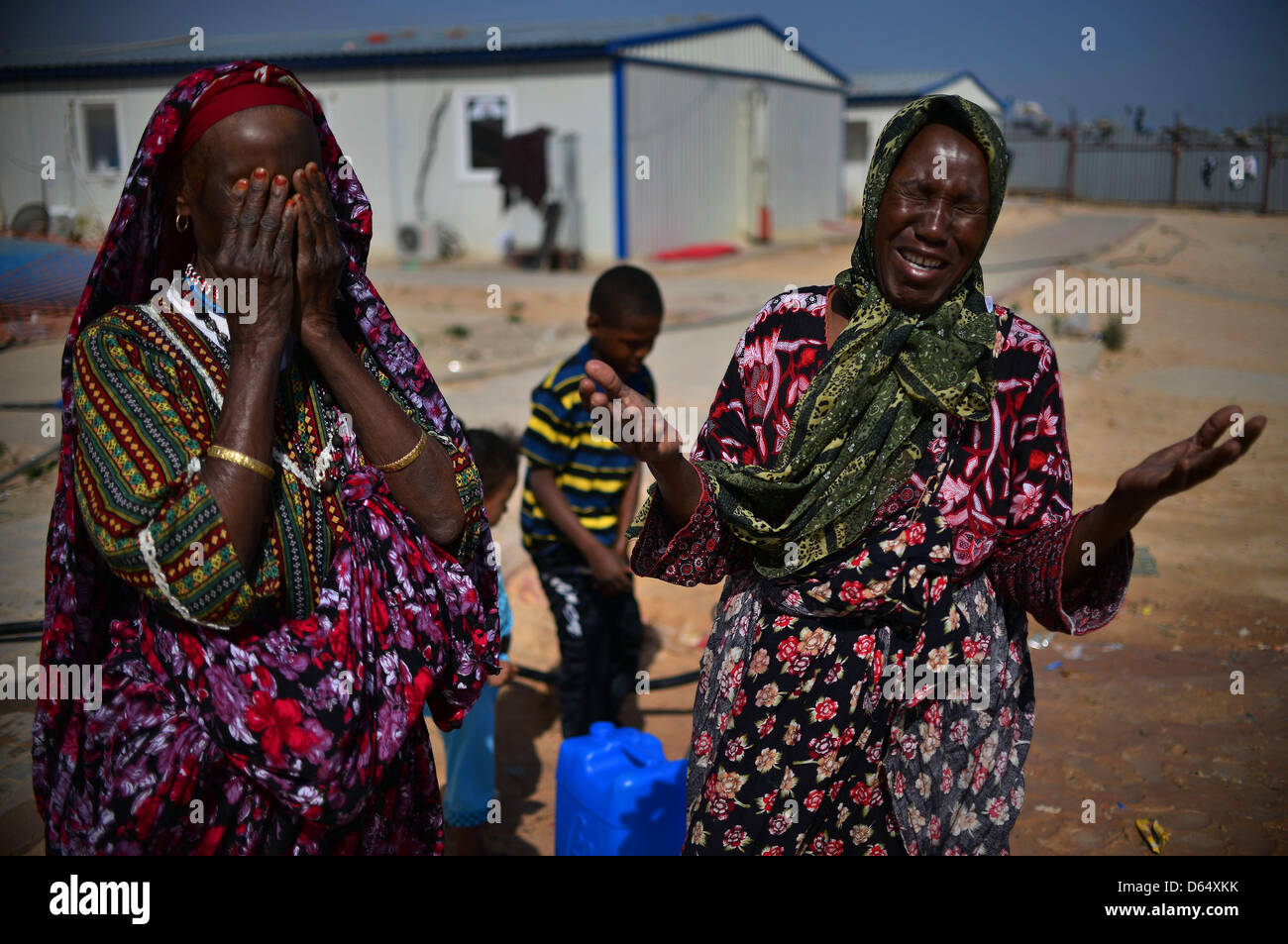 People cry home destroyed hi-res stock photography and images - Alamy
