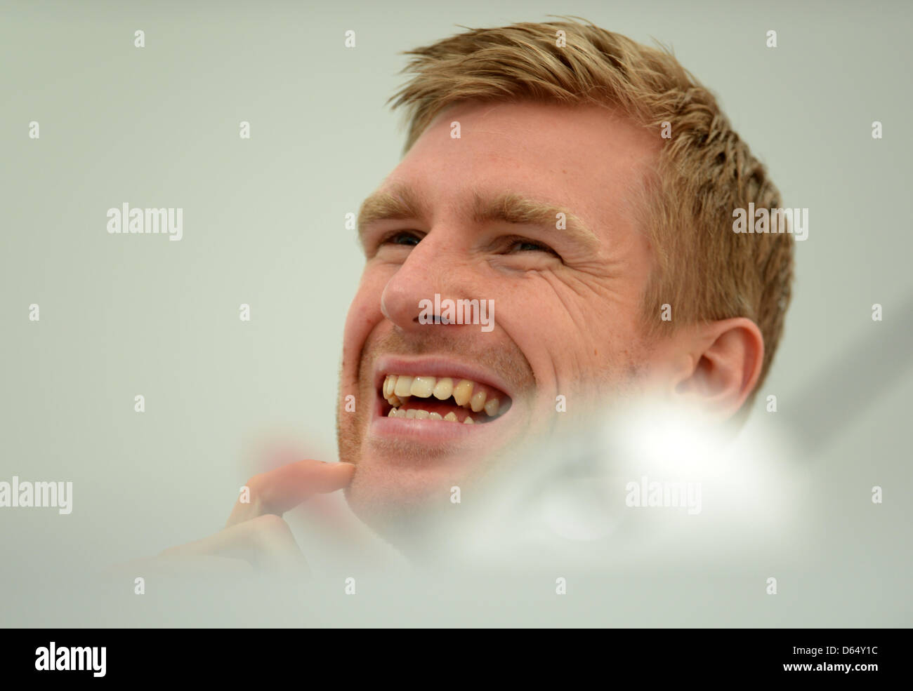 Germany's Per Mertesacker laughs during a press conference of the ...