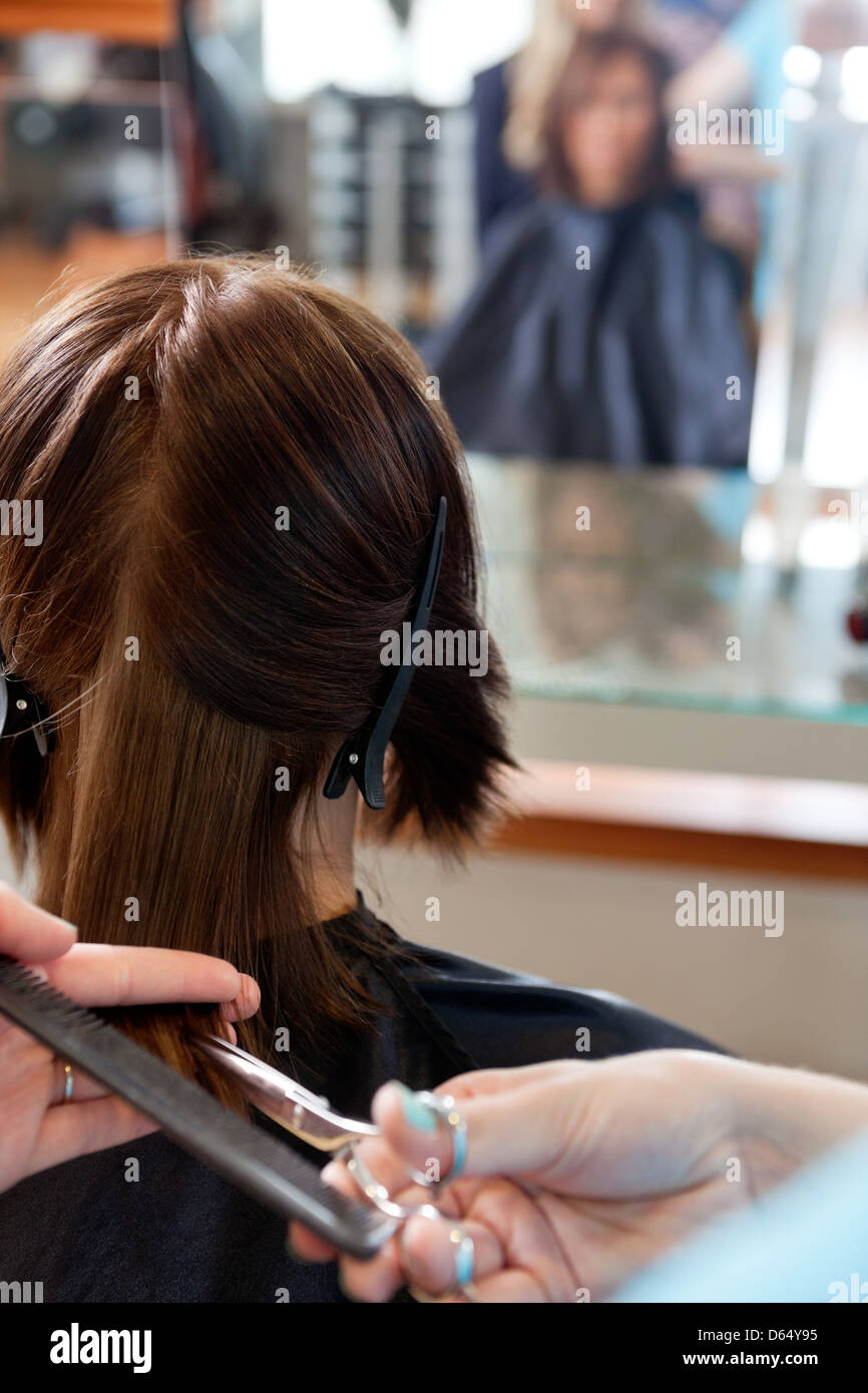 Woman Getting a Haircut Stock Photo - Alamy