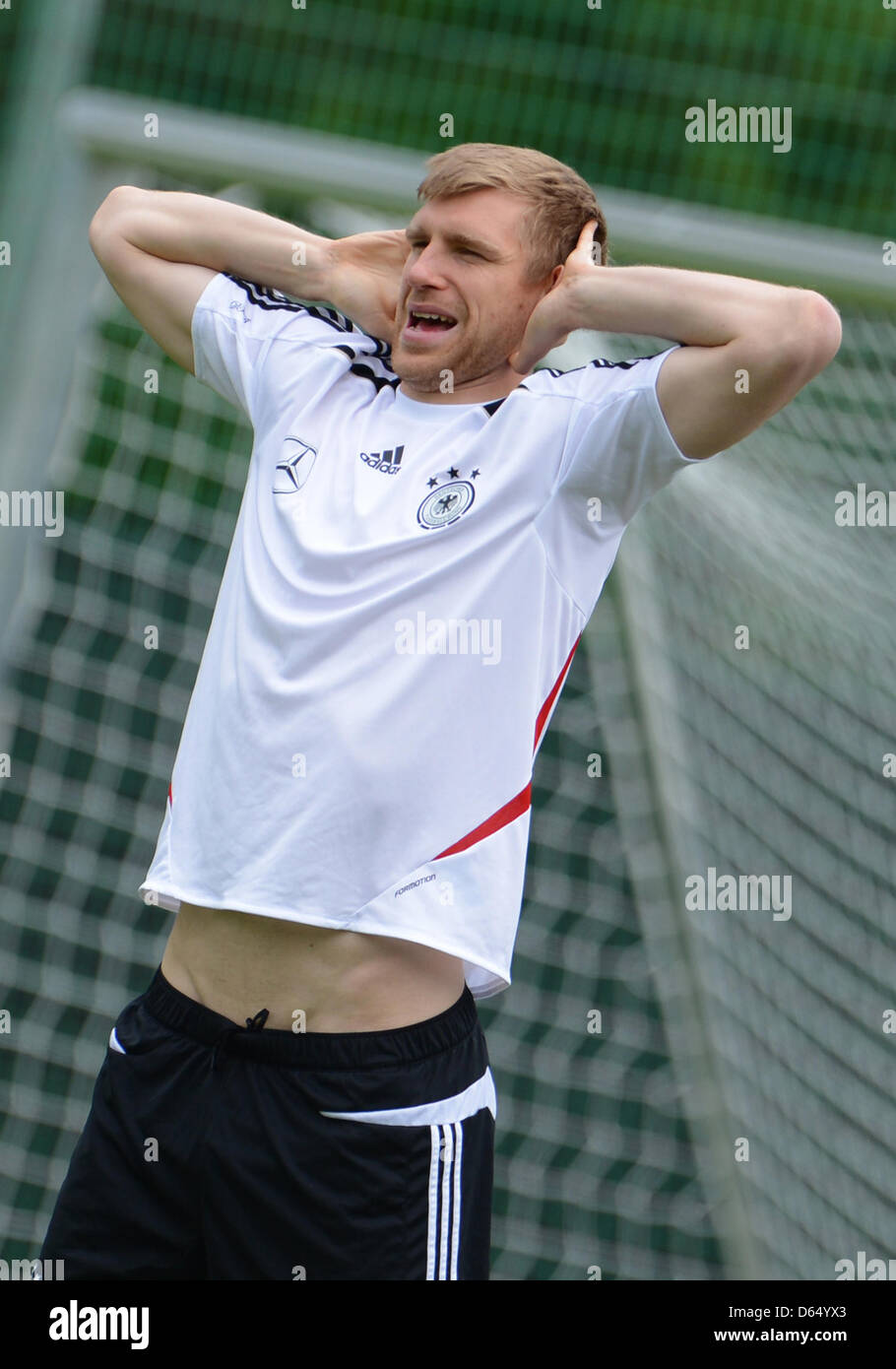 Germany's Per Mertesacker gestures during a training session of the ...