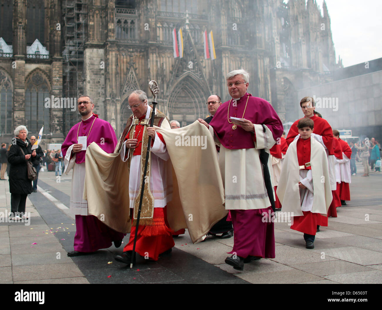 Cardinal Joachim Meisner (C) holds the Corpus Christi procession in the ...