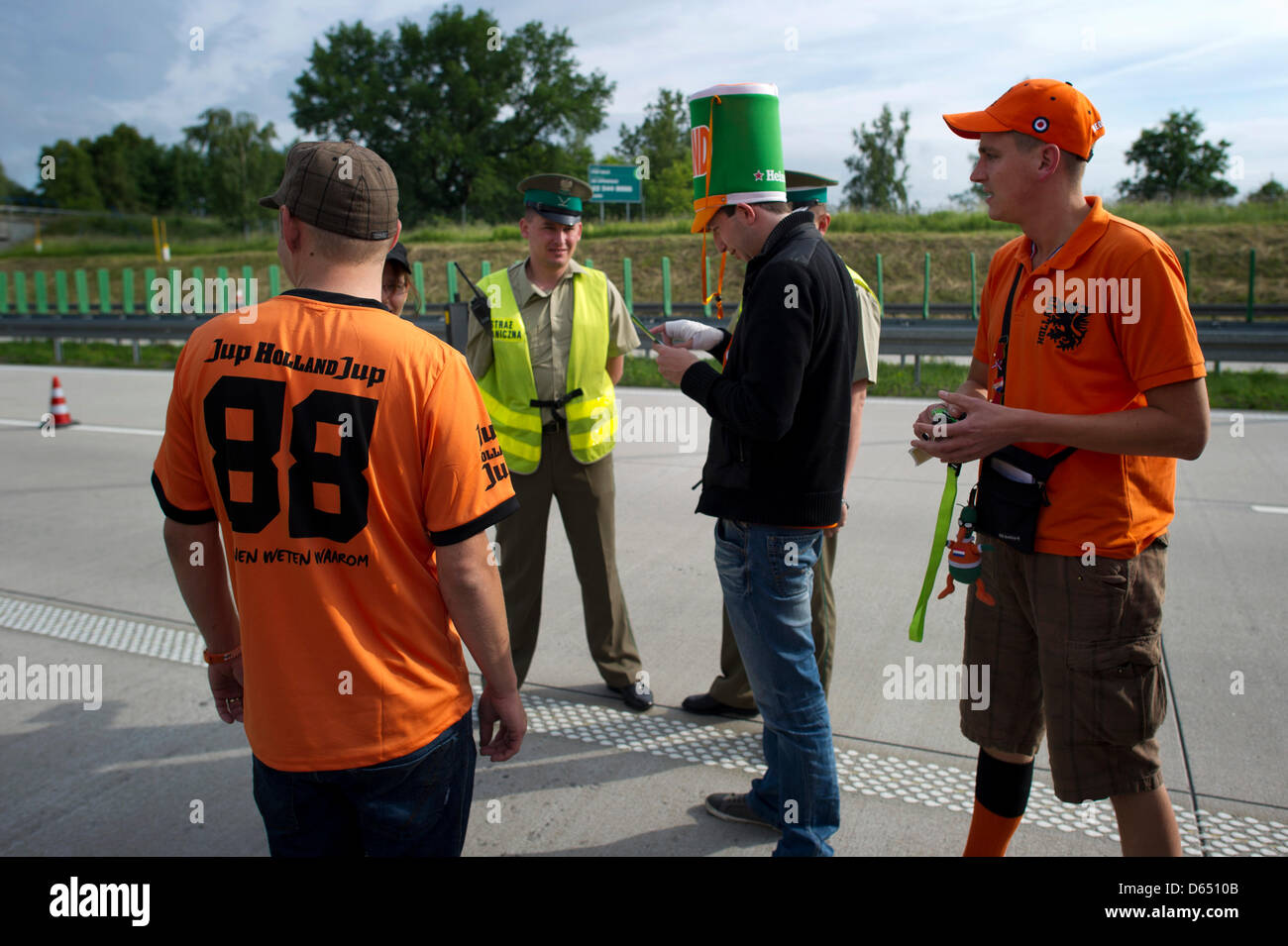 Polish policemen and customs officials staff a border checkpoint at the ...