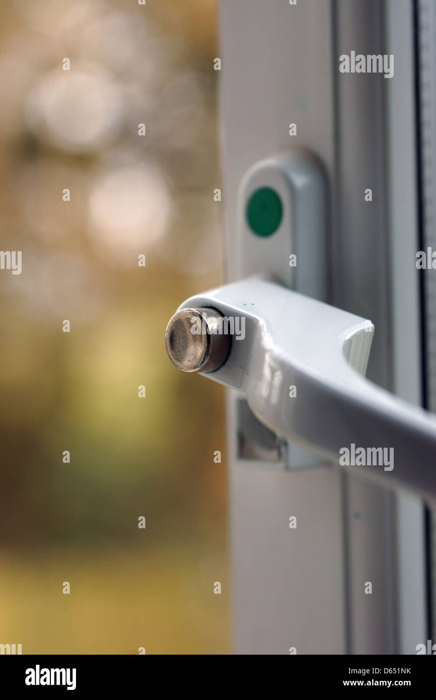 window handle window glazing chrome Stock Photo - Alamy