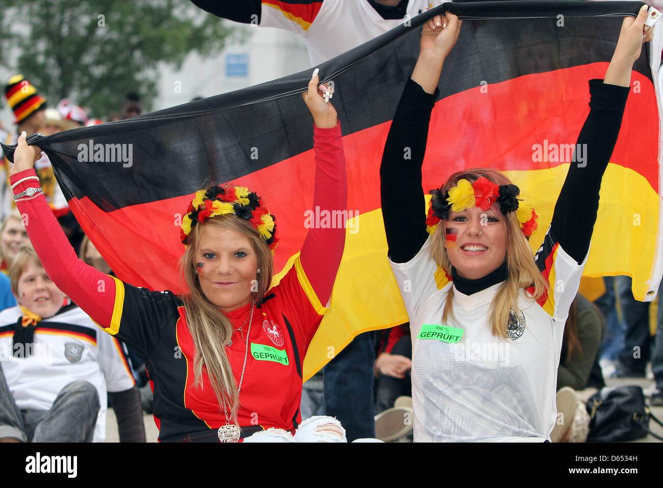 Soccer fans cheer prior to the UEFA EURO 2012 group B soccer match ...