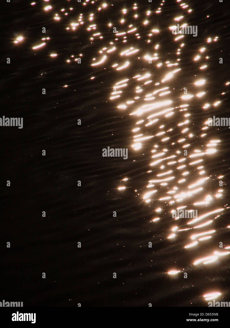 The photo captures sun reflections creating a star-like pattern on the ...