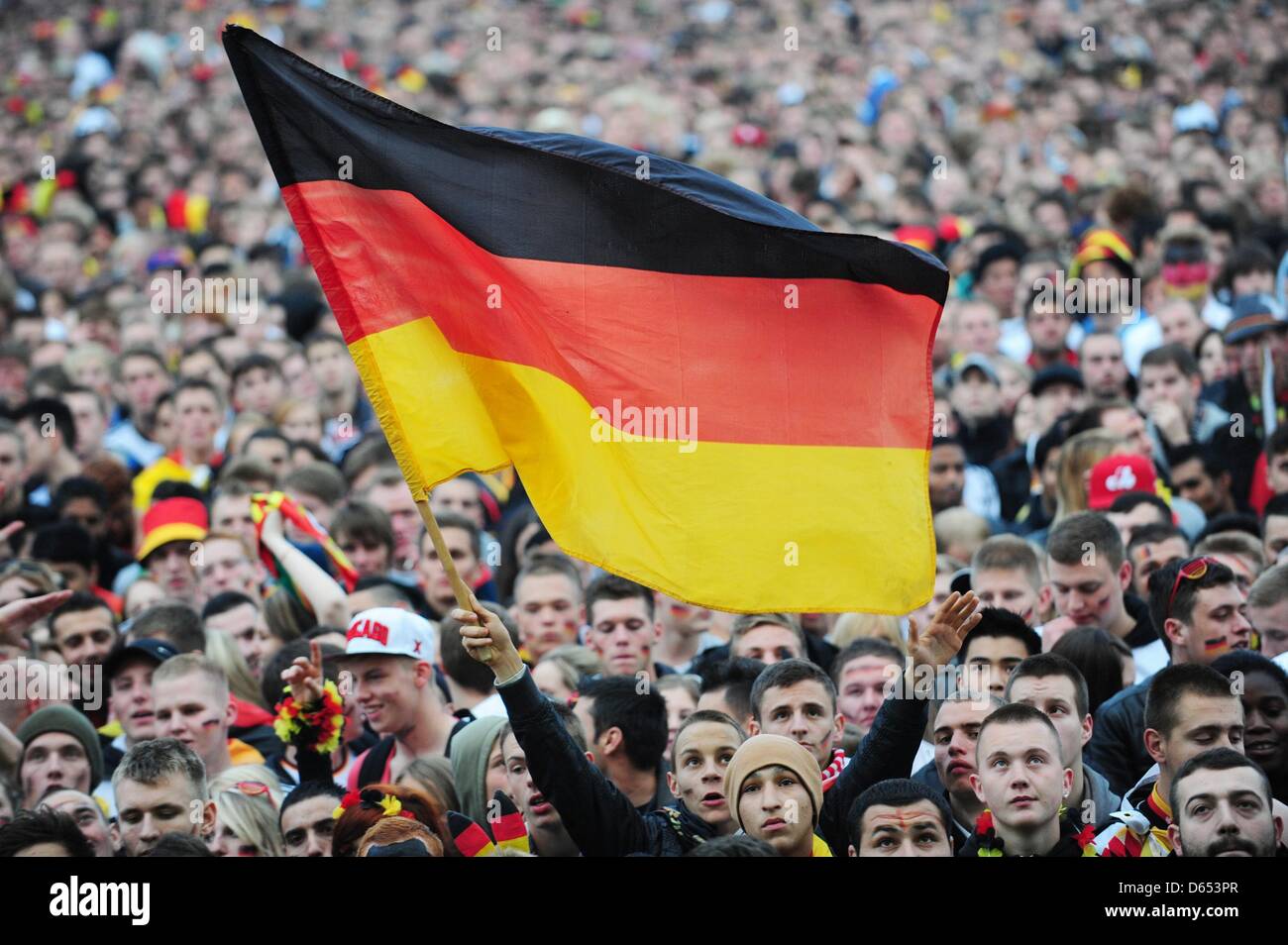 Soccer fans follow the UEFA EURO 2012 group B soccer match between ...