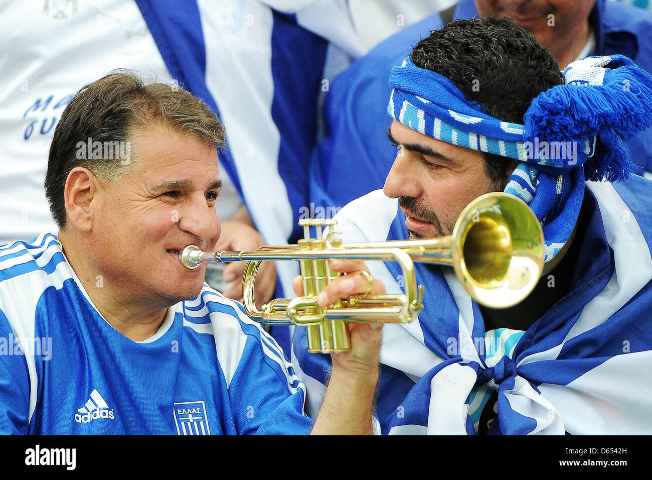 Fans of Greece cheer during the UEFA Euro 2012 match between Poland and ...
