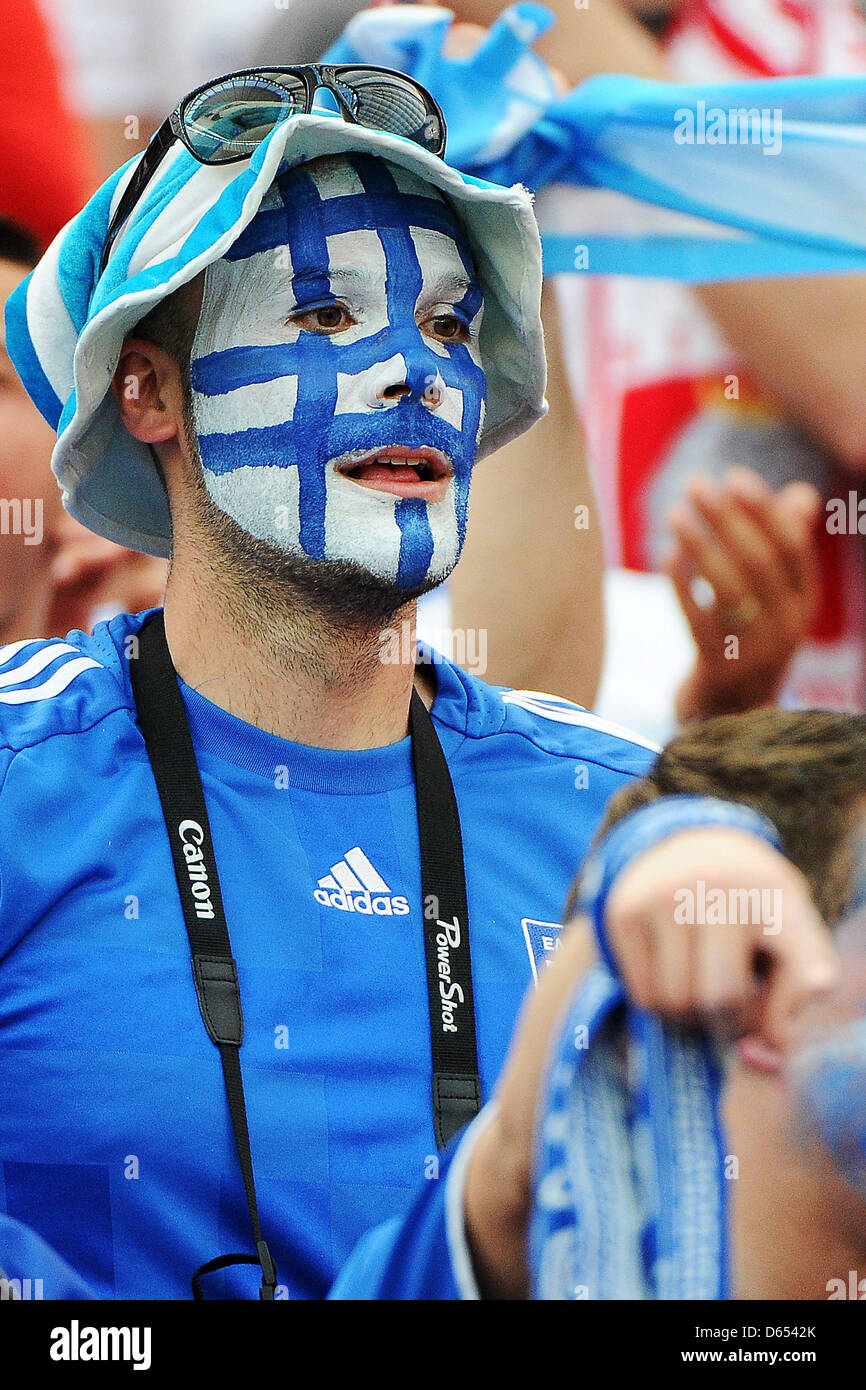 Fans of Greece cheer during the UEFA Euro 2012 match between Poland and ...