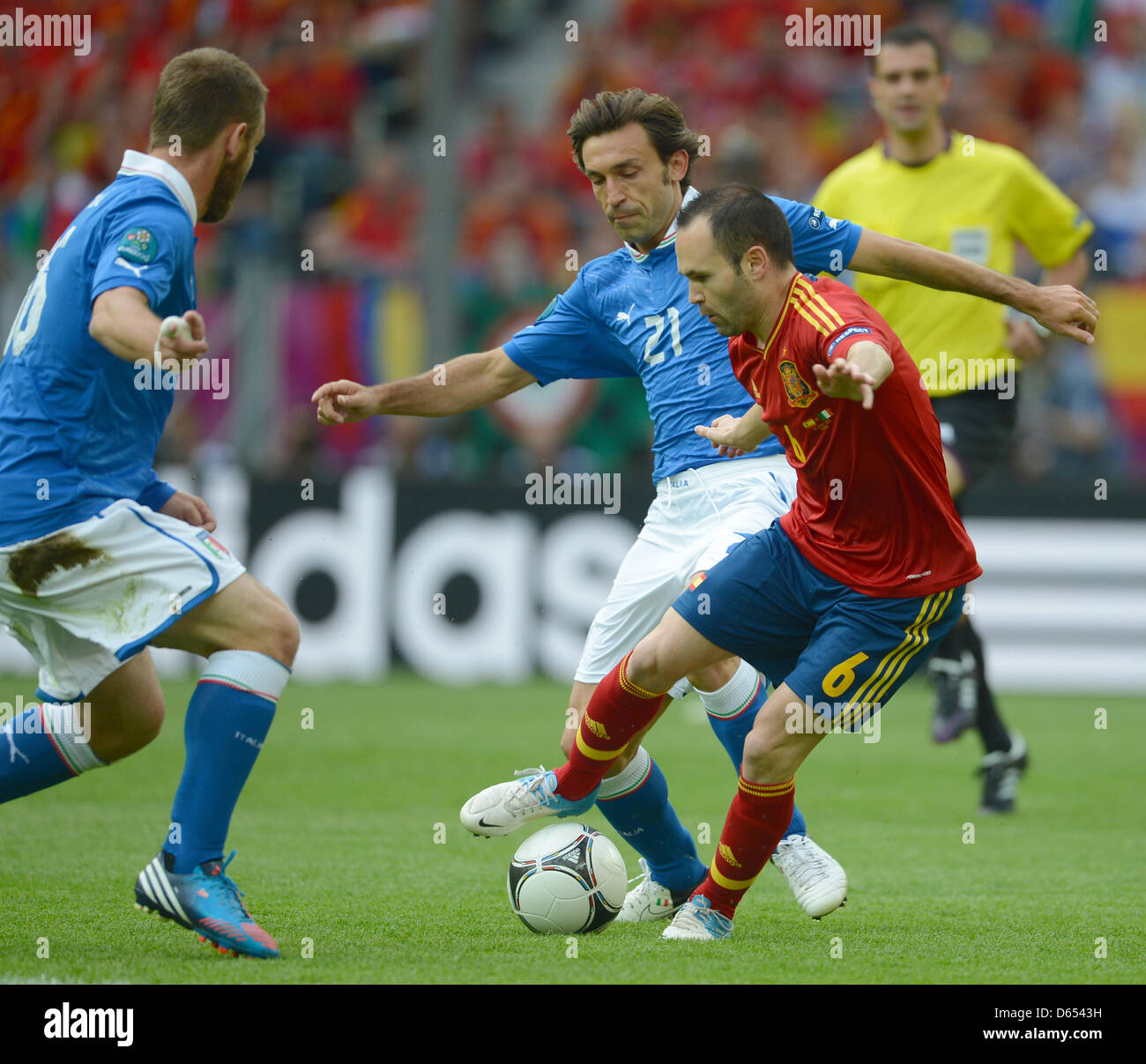 Spain's Andres Iniesta (R) and Italy's Andrea Pirlo vie for the ball ...