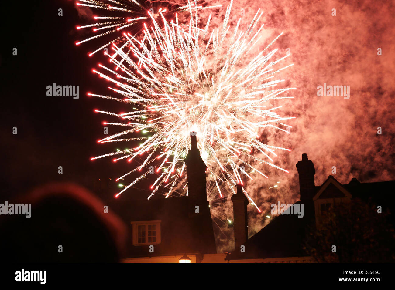 hastings battle bonfire night sky fireworks bronze red color houses ...