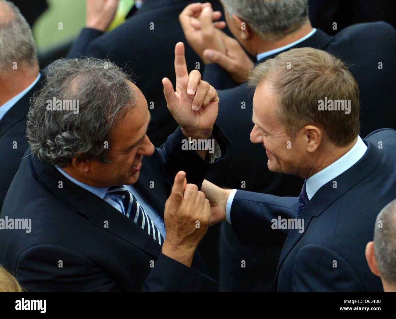 UEFA president Michel Platini (L) talks to Poland's president Donald ...
