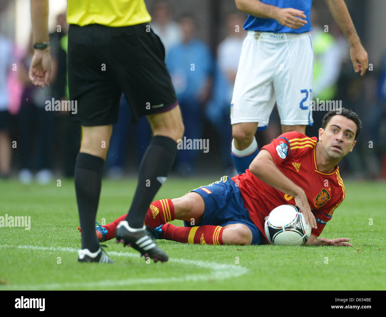 Spain's Andres Iniesta lies on the pitch during UEFA EURO 2012 group C ...