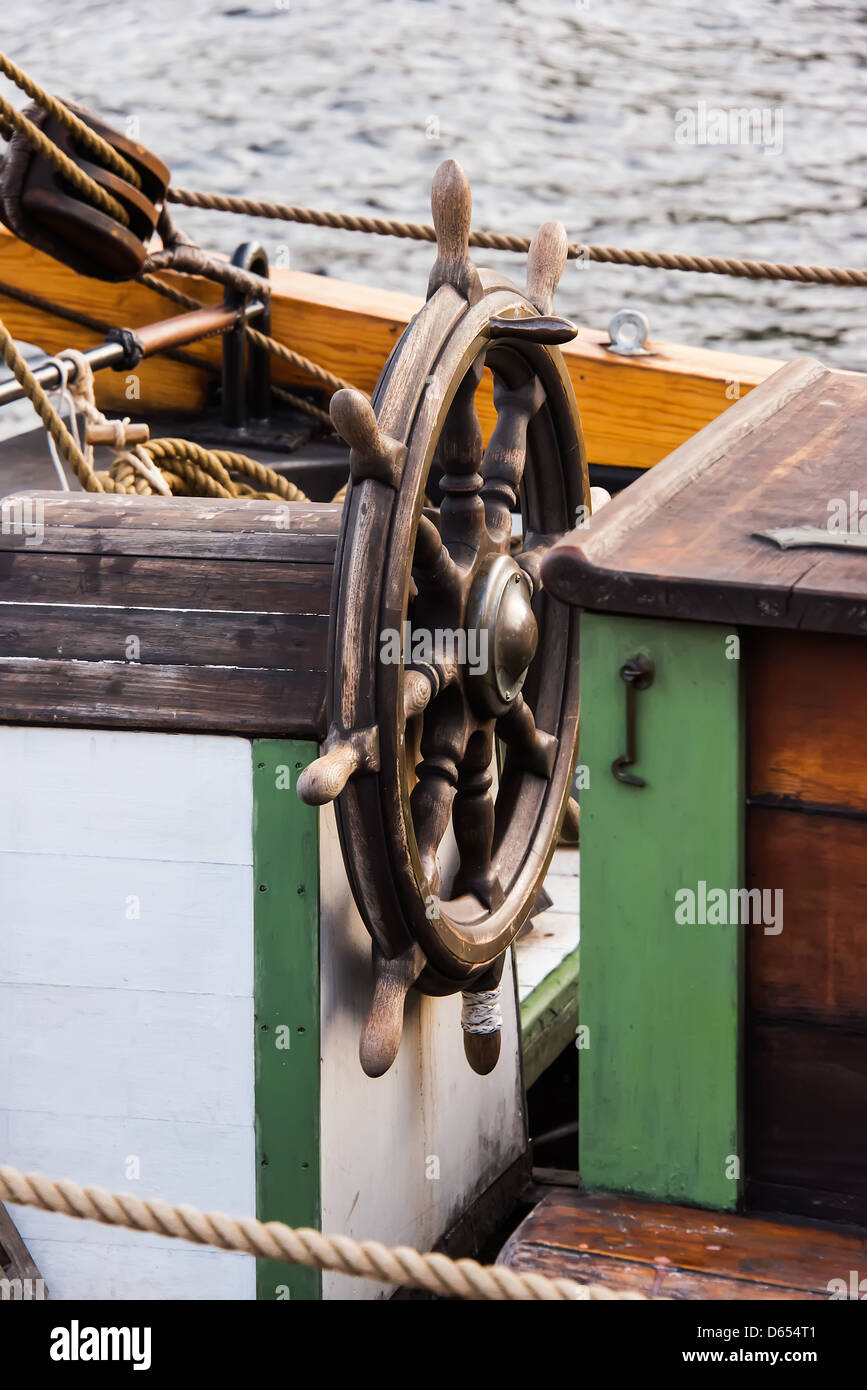 Old wooden ship wheel Stock Photo - Alamy